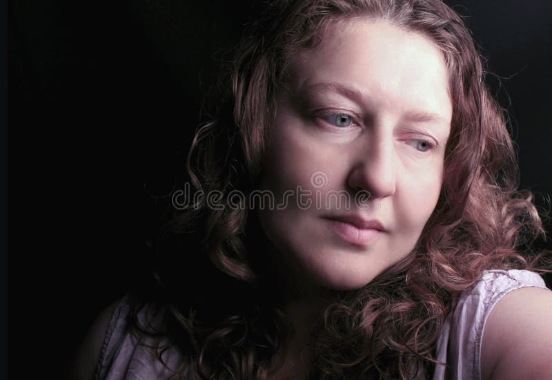 Low key woman stock image. Image of aged, middle, lonely - 10105209