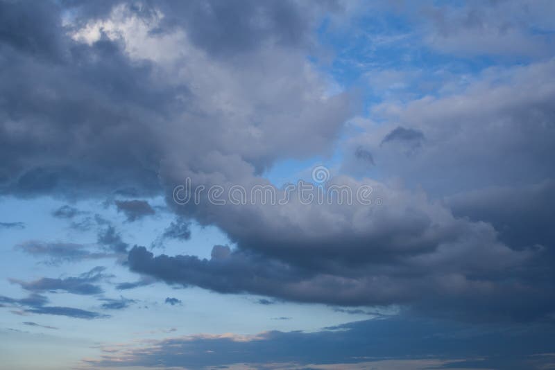 Low Storm Clouds in the Blue Sky Background Stock Photo - Image of ...