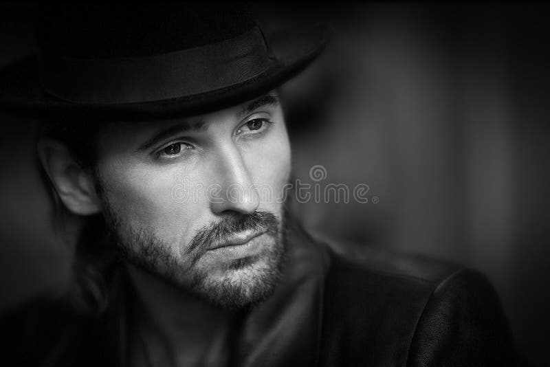 Low Light Black and White Photo of a Bearded Stylish Man Stock Photo ...
