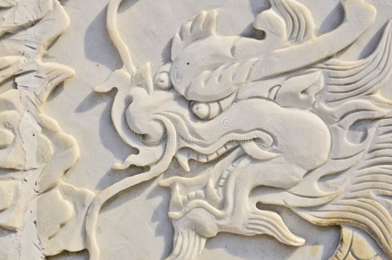 Low relief dragon stock image. Image of tradition, stone - 59130095