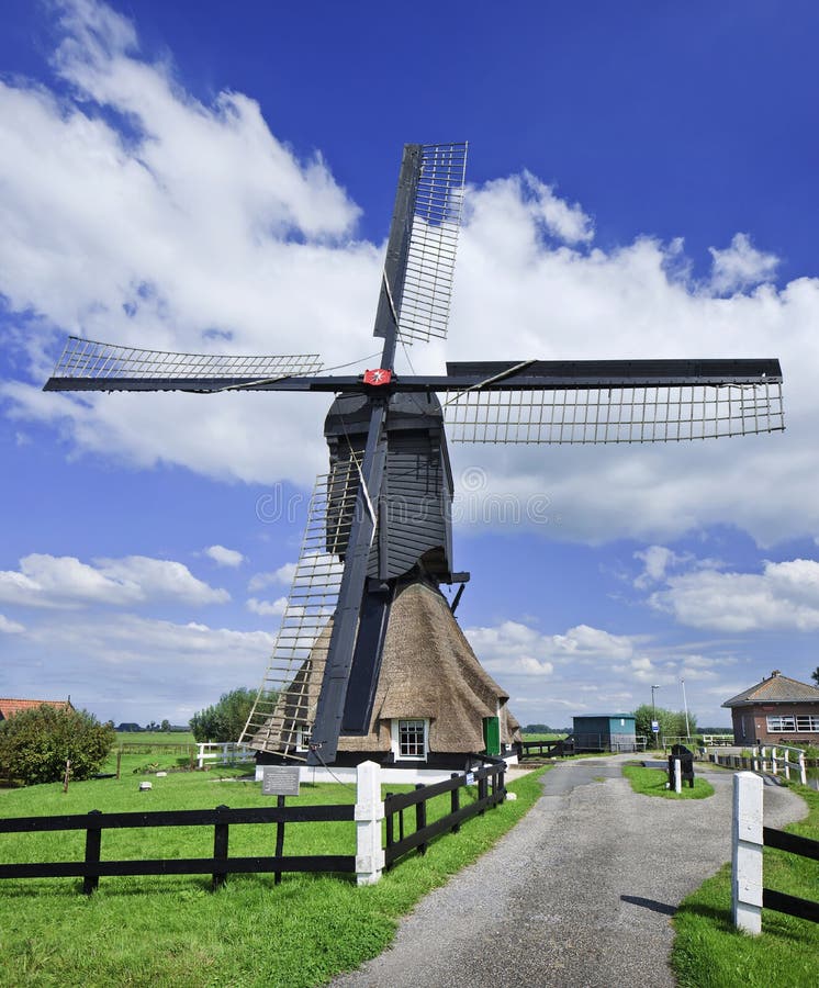 Low Sail Wip Mill in a Polder with a Blue Sky and Dramatic Shaped ...