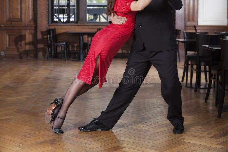 Low Section of Dancer Leaning on Partner while Performing Tango Stock ...
