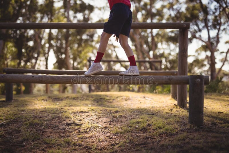 Low Section of Kid Walking on Obstacle during Obstacle Course Stock ...
