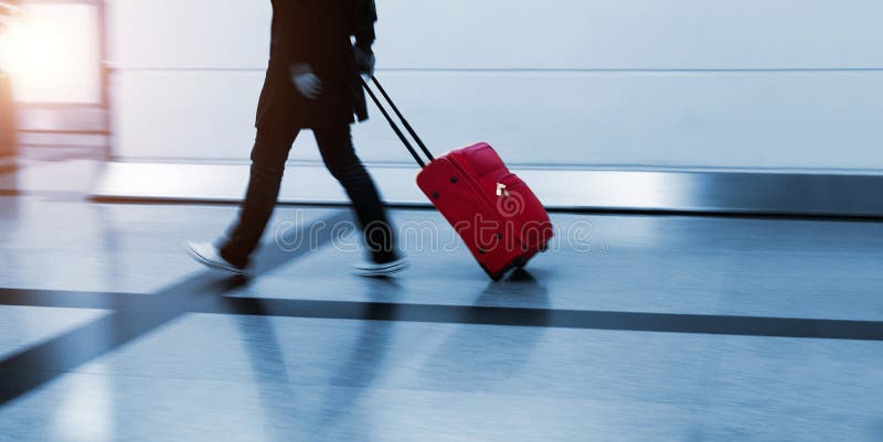 Man Pulling Red Bag Rushing at the Airport Stock Image - Image of leave ...