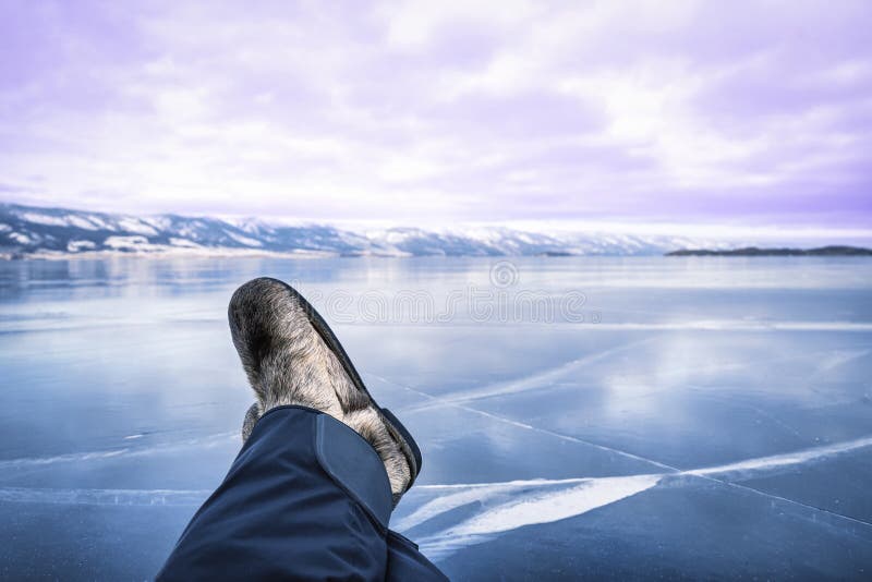 Low Section of People Standing on the Ice. Stock Photo - Image of ...