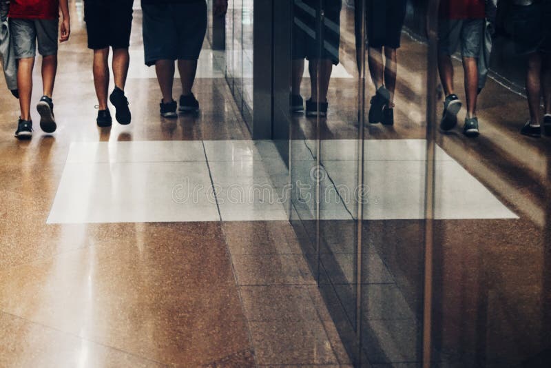 Low Section of People Walking on Floor Stock Photo - Image of female ...