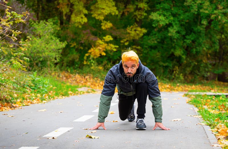 Low Start Runner Prepares To Run Stock Photo - Image of start, athlete ...