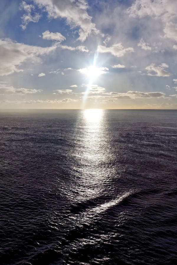 Low Sun Reflected in Dark Ocean Stock Image - Image of black, dawn ...