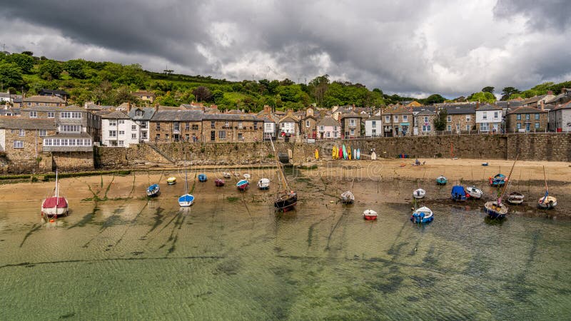 Low Tide in Mousehole Harbour, Cornwall, England, UK Editorial Stock ...