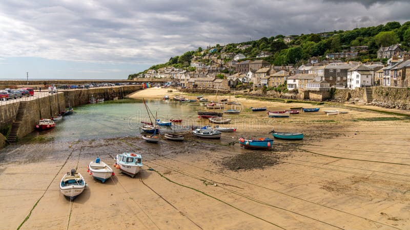 Low Tide in Mousehole Harbour, Cornwall, England, UK Editorial Stock ...