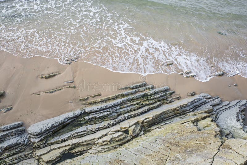 Eroded Tide Pool Rock Formation in California. Sunset Sky Reflection in ...
