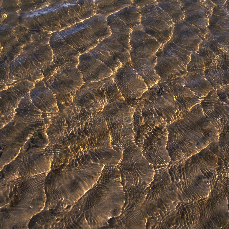 Low Tide Water Ripples in Sun Stock Photo - Image of sand, shore: 232915414