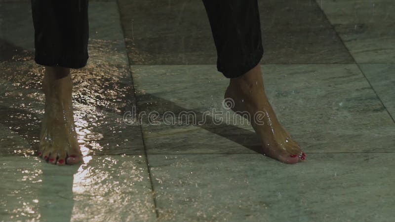 Low View of Female Legs Walks Barefoot Under Heavy Rain Stock Video ...