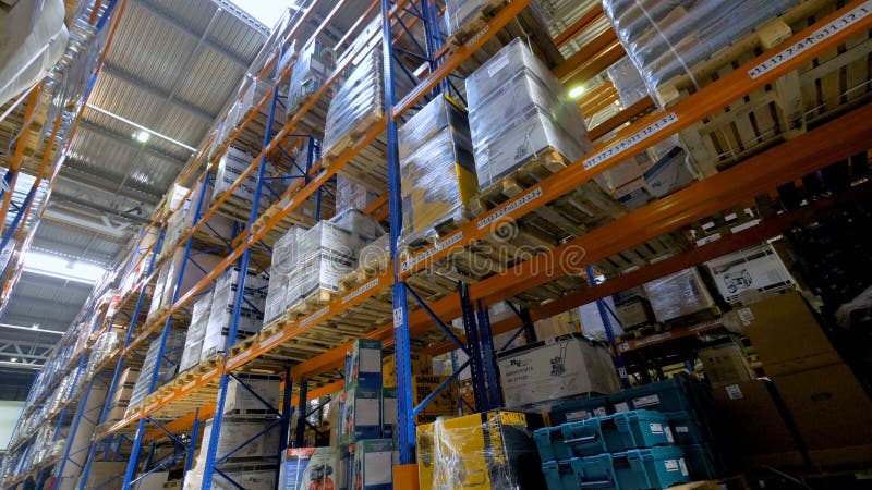 A Low Angle View on a High Warehouse Rack Full of Boxes. Stock Footage ...