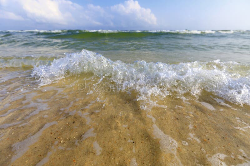 Low View of Waves Crashing Down on the Beach Stock Photo - Image of ...