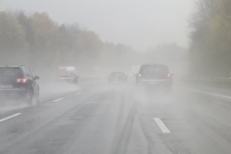 Traffic on the Freeway during a Storm. Heavy Rain on a Road Stock Photo ...