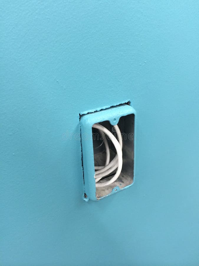 Low Voltage Data Wires in a Construction Box on Blue Wall Stock Image ...