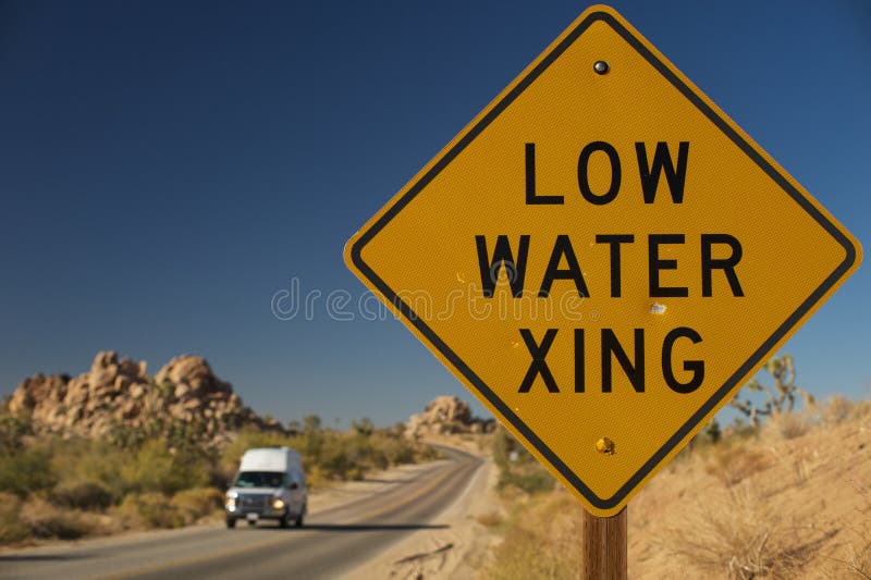 Low Water Xing Sign stock image. Image of blue, signs - 28505197