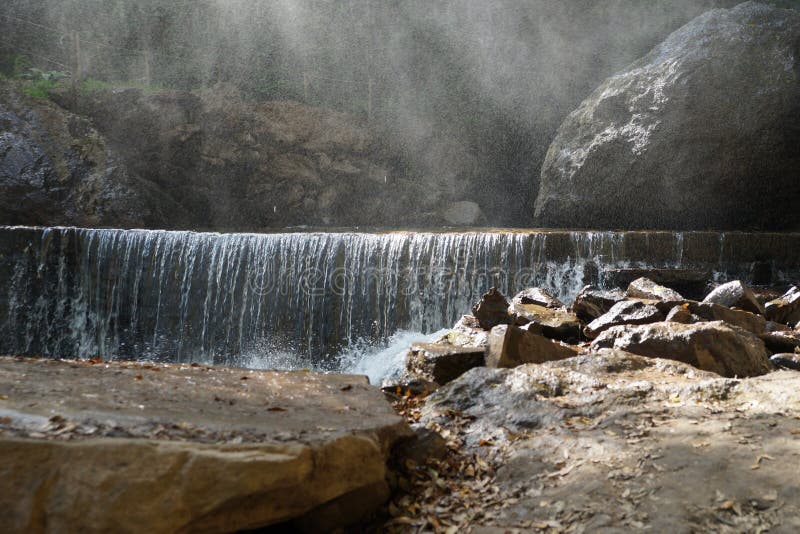 Low Waterfall with Water Fog and Indistinct Pedestrian Trail on the ...