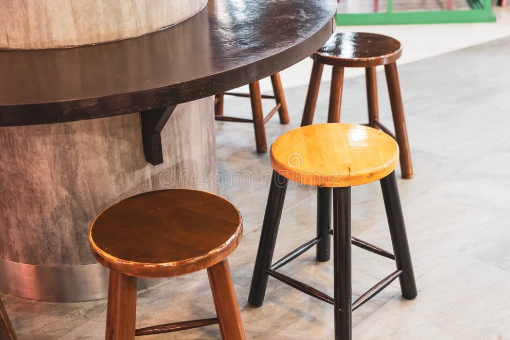 Low Wooden Chairs Around Wooden Bar Table Support Stock Image - Image ...