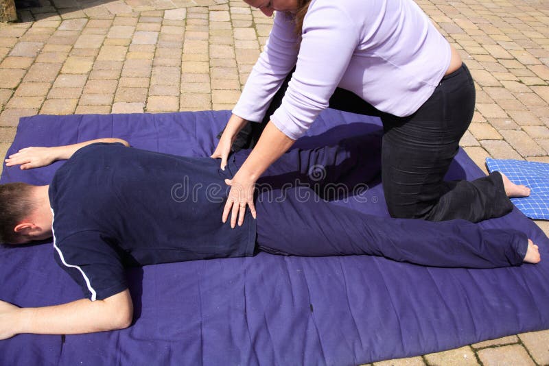 Lower back massage stock photo. Image of relax, clothing - 2818784