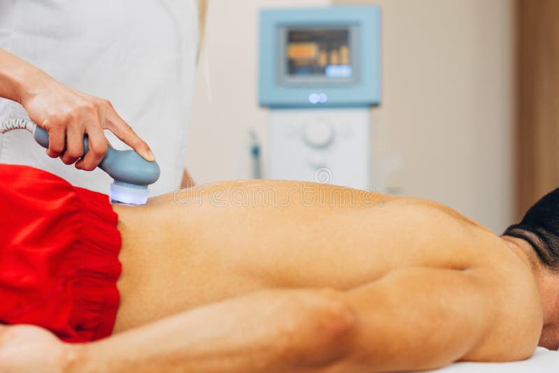 Lower Back Ultrasound Therapy Stock Photo - Image of females, patient ...