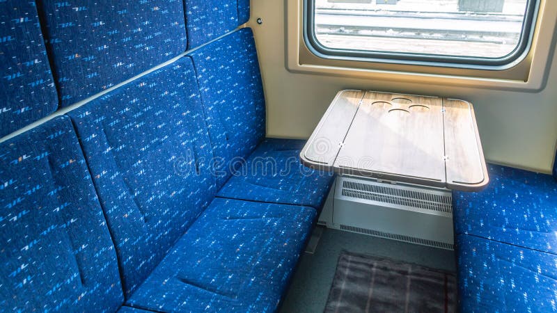 The Lower Bed and Table in the Compartment of the Passenger Car Stock ...