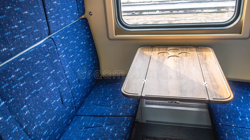 The Lower Bed and Table in the Compartment of the Passenger Car Stock ...