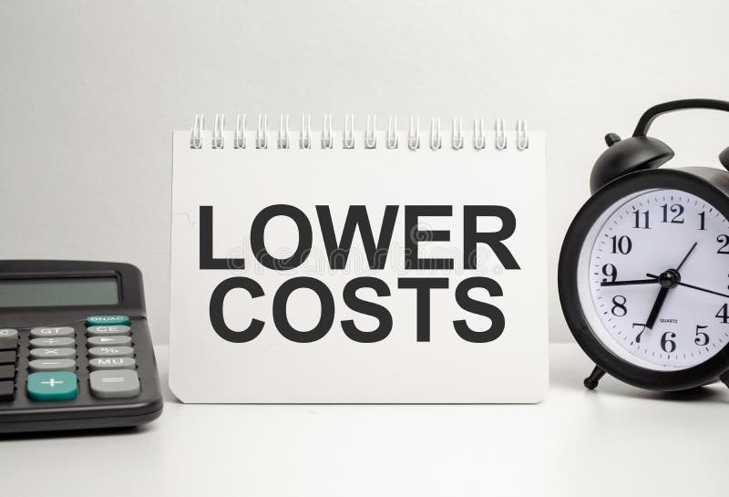 LOWER COSTS Words with Calculator and Clock with Notebook Stock ...