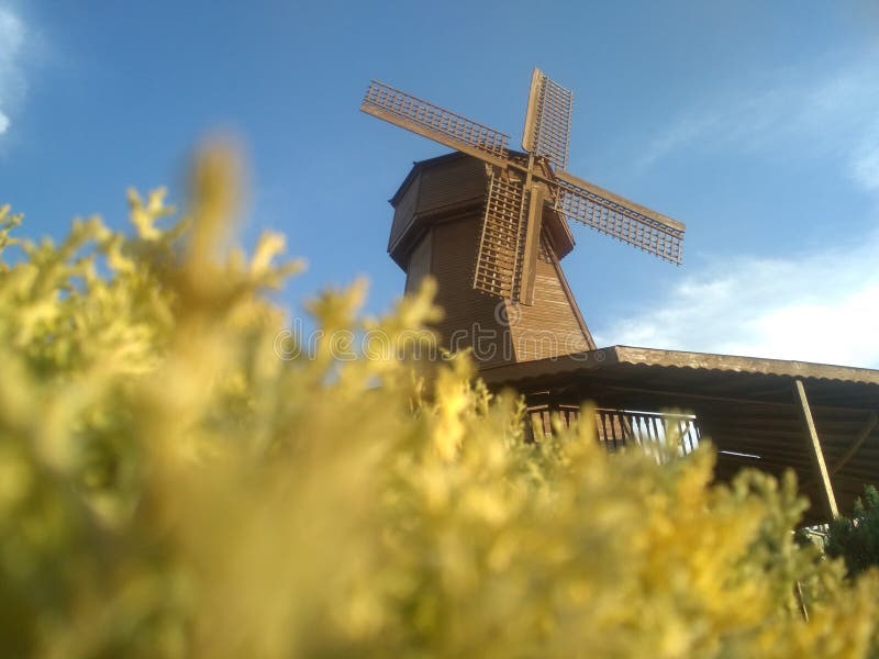 The Lower Left Blade of a Wooden Windmill during Operation Makes a ...