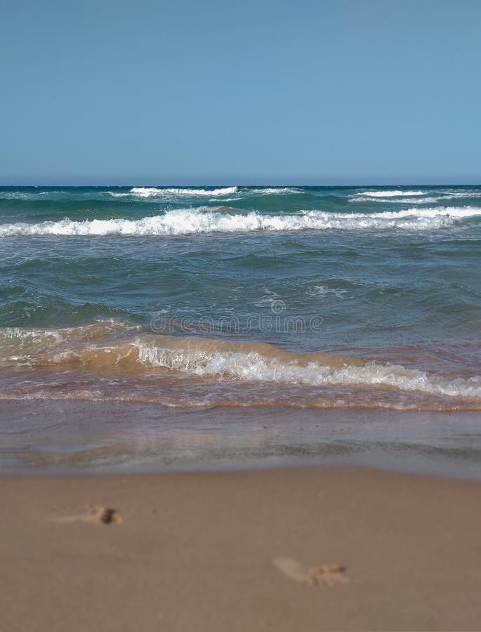 Lower View of the Beach Shore with Some Waves Stock Image - Image of ...