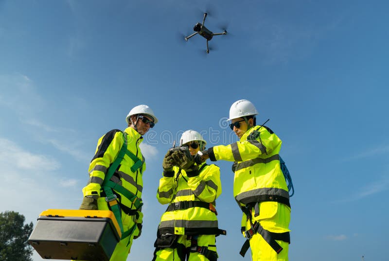 Lower View of Wind Turbine or Windmill Worker Woman or Engineer Use ...