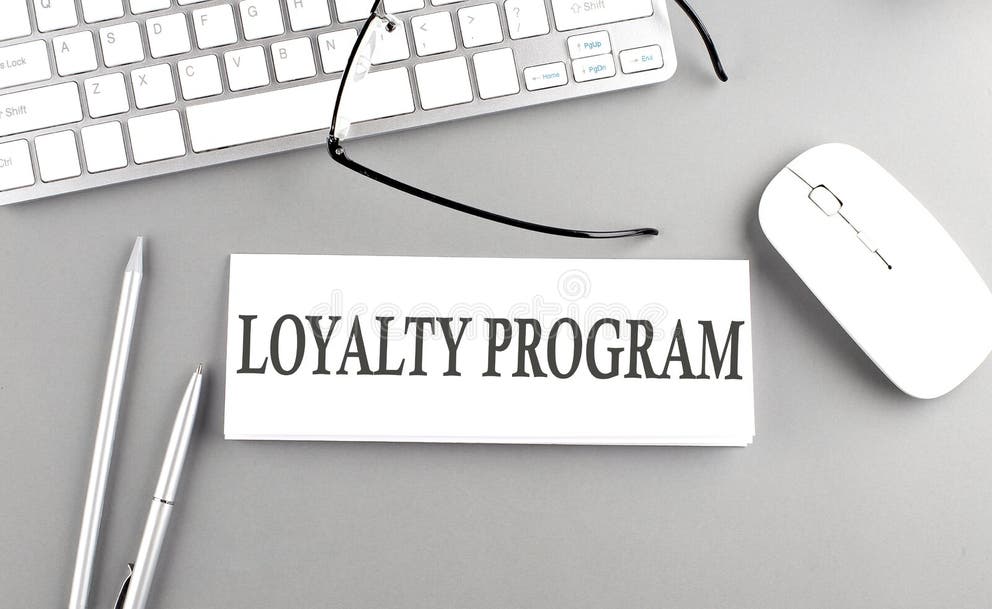 LOYALTY PROGRAM Text on Paper with Keyboard on Grey Background Stock ...