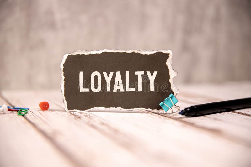 Loyalty Text on a Notepad on Chart with Keyboard and Calculator. Stock ...