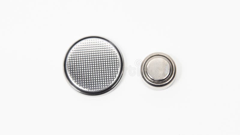 LR44 and CR2032 Button Cell Batteries on a White Background. Close Up ...