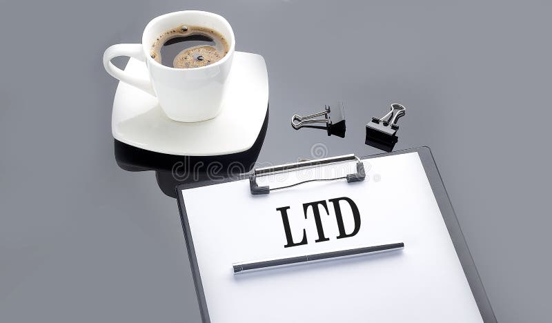 LTD Text on Paper Sheet with Coffee on the Black Background Stock Image ...