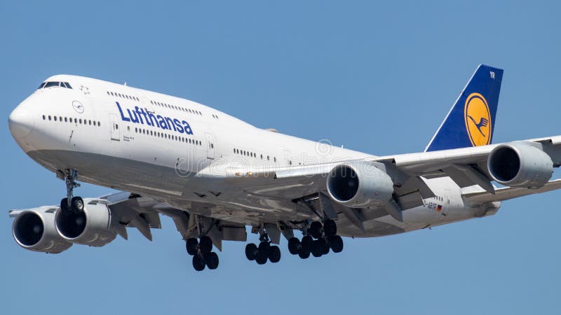 Lufthansa Airlines Aircraft Soaring Against a Blue Sky Backdrop ...