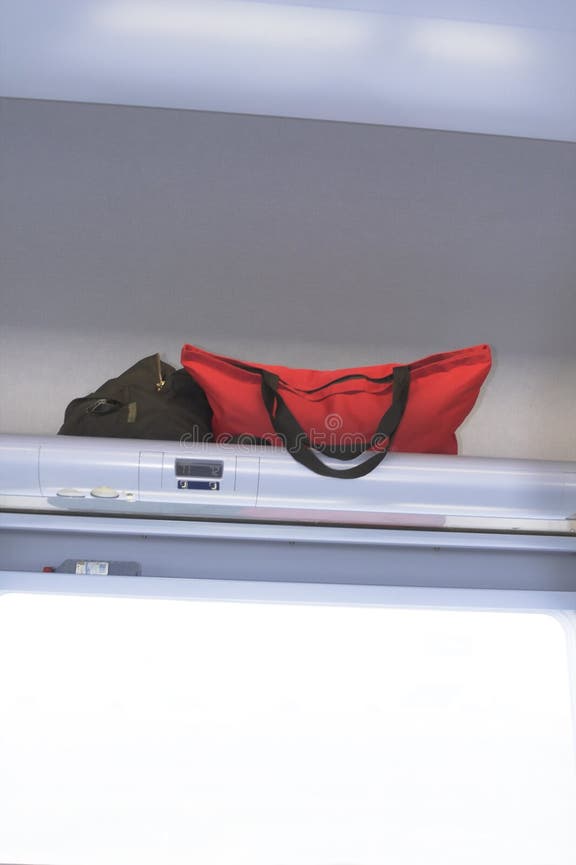 Luggages Inside an Airplane Stock Image - Image of empty, plane: 1885873