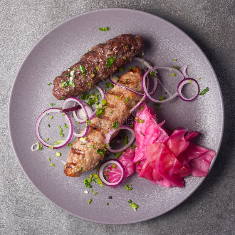 Lula Kebab of Pork and Beef with Pickled Cabbage and Red Onion. Top ...