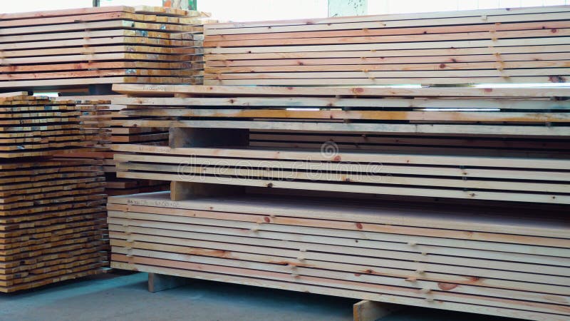 Lumber in a Large Warehouse. Wooden Boards in the Stack Stock Footage ...