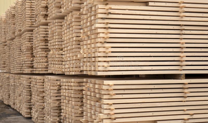 Lumber Warehouse. Wooden Boards in a Stack Stock Photo - Image of ...