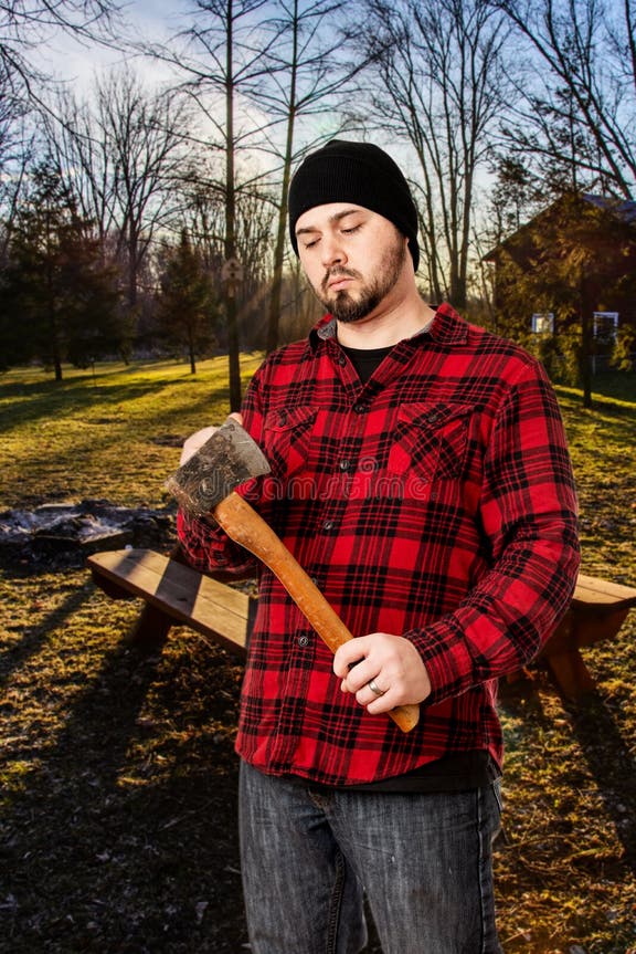Lumberjack Woodsman Checking Axe Sharpness Stock Photo - Image of ...