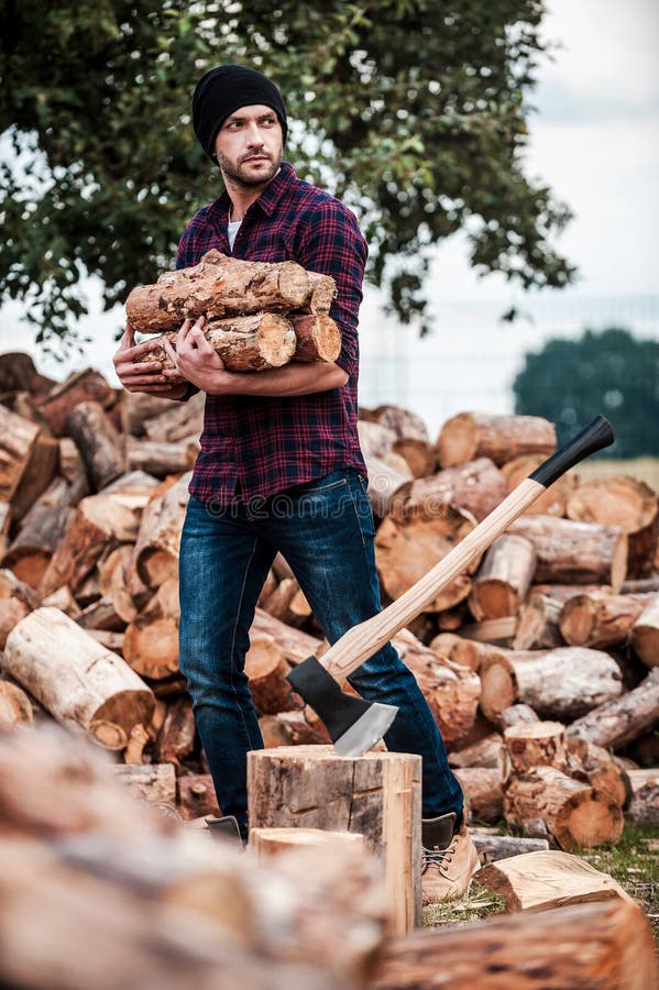 Lumberjack at work. stock photo. Image of cutting, timber - 59487574