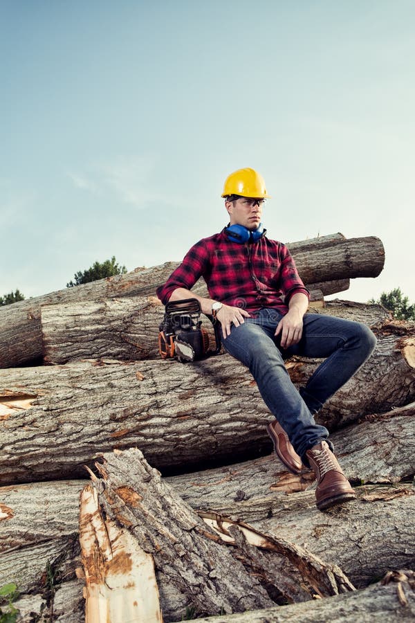 Lumberjack Worker Sitting in the Forest Stock Image - Image of ...