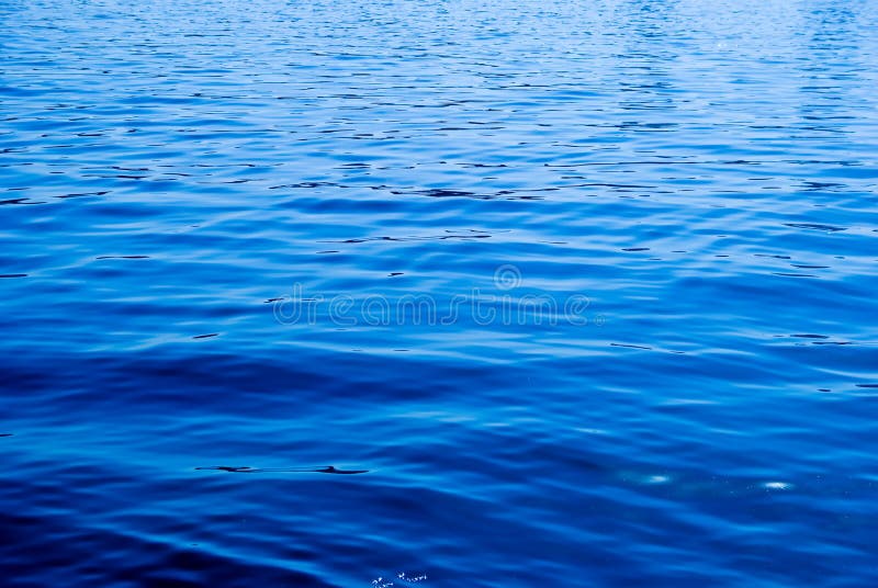 Surface d'eau de mer photo stock. Image du sunlight, paisible - 11976654