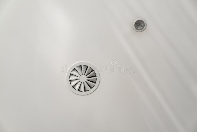 Luminaire and Diffuser Fan on the White Ceiling. Stock Image - Image of ...