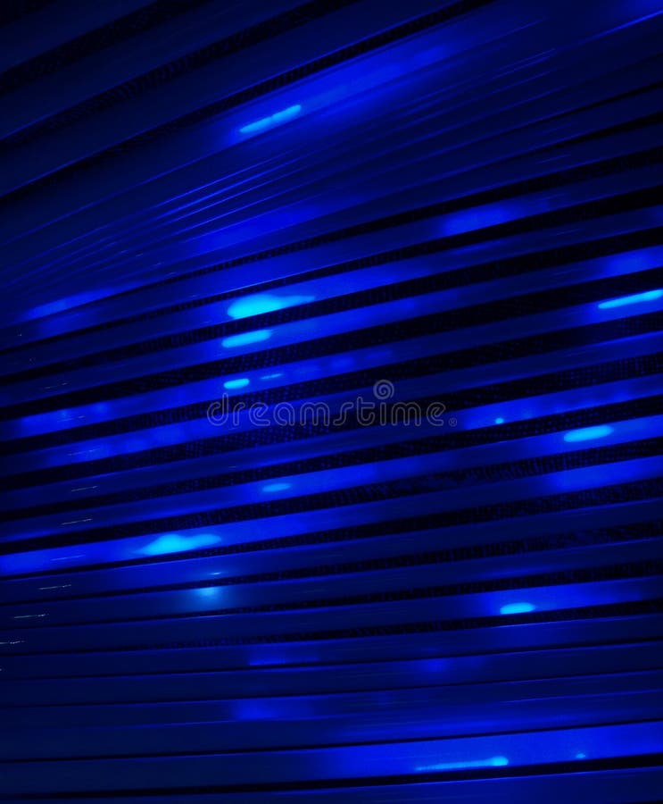 Luminous Blue Cylinders in the Dark Stock Illustration - Illustration ...