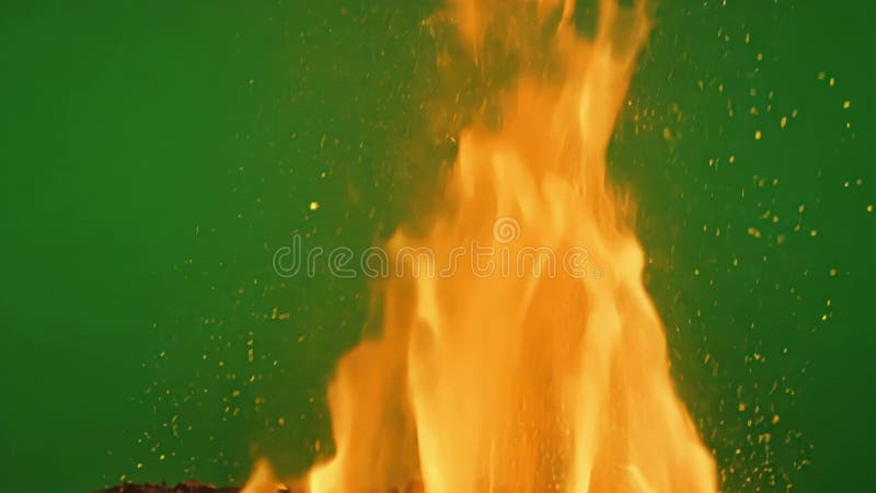 Luminous Fire Creating a Warm Glow Against Green. Green Screen ...