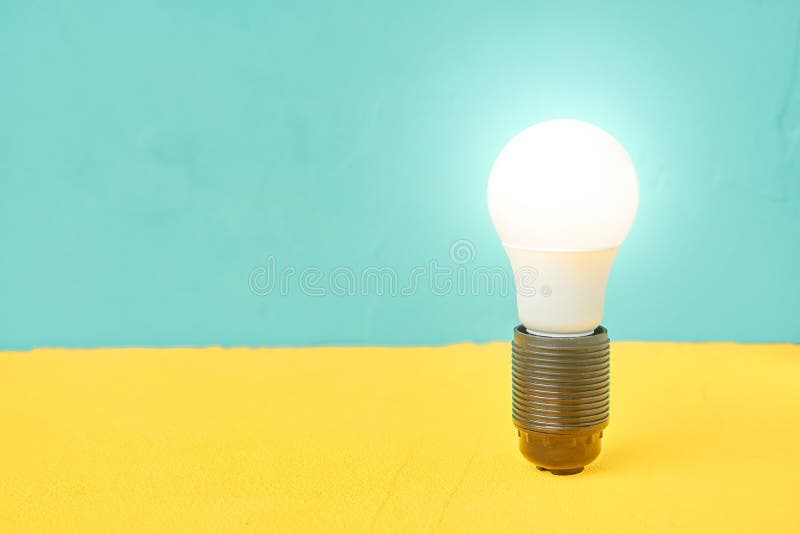 Luminous Led Lamp in an Electric Socket. Energy Conservation Concept ...