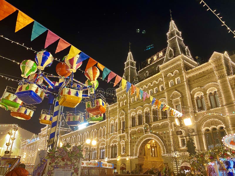 Luminous Building and Carousel in Lights Stock Photo - Image of flux ...
